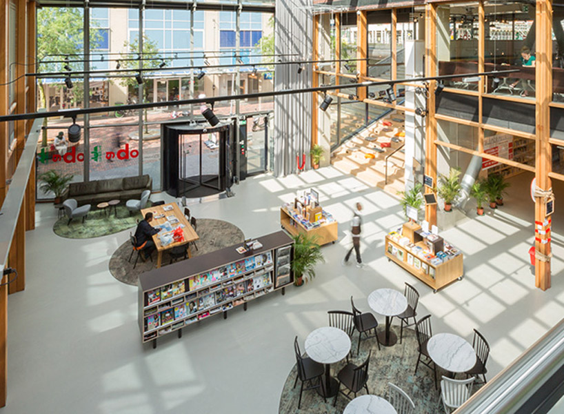 the building itself is transformed into a fresh urban living room, in a ...