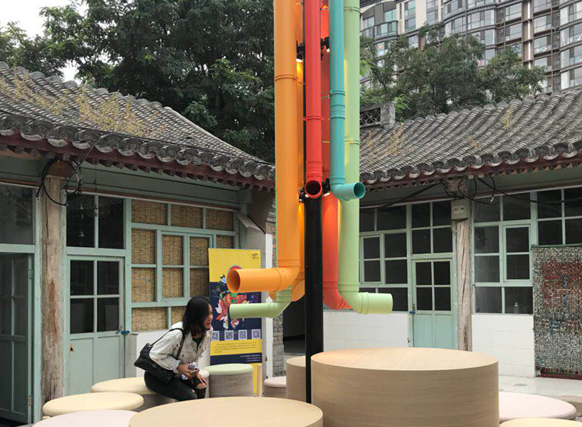 the installation seeks to create a ‘new neighborhood’ within the often ...