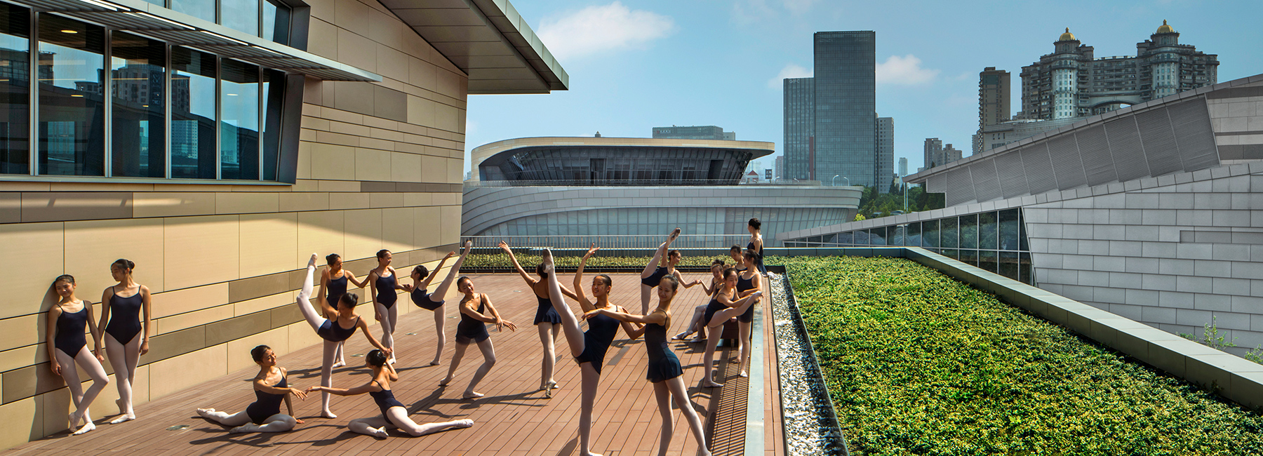 shanghai international dance complex features gently curved buildings