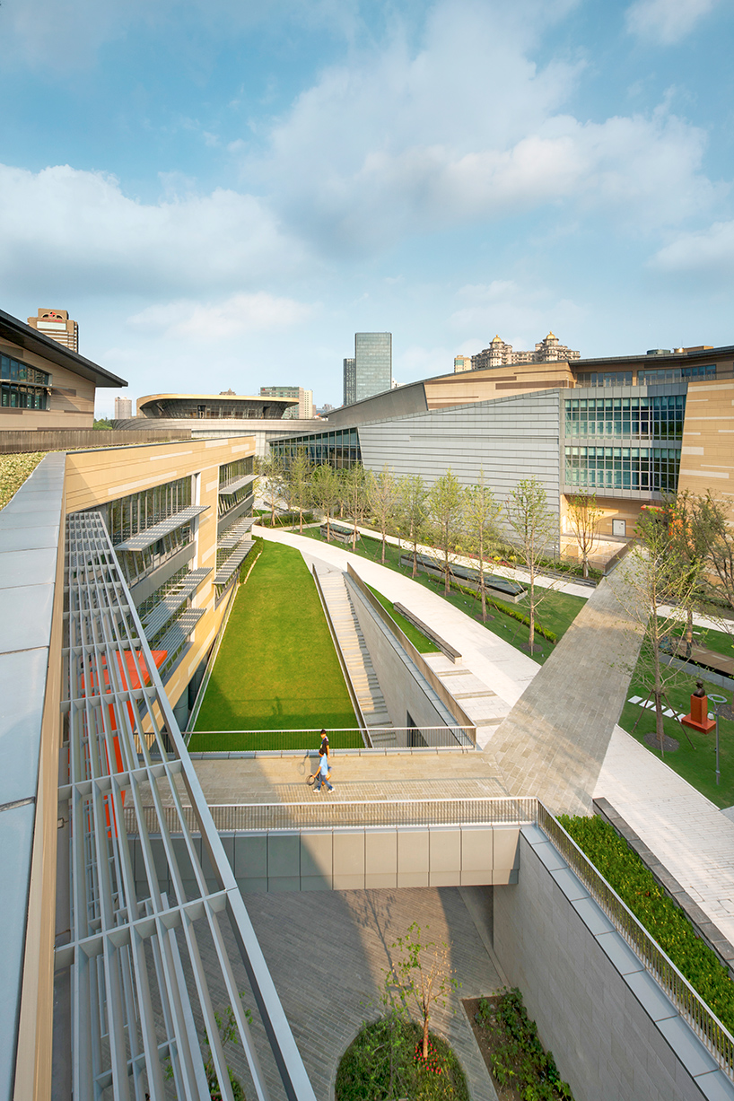 shanghai international dance complex features gently curved buildings
