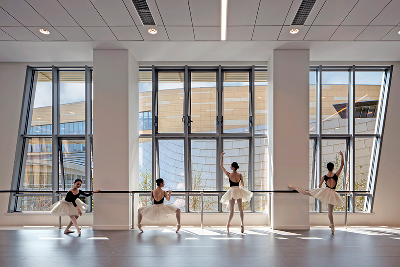 shanghai international dance complex features gently curved buildings