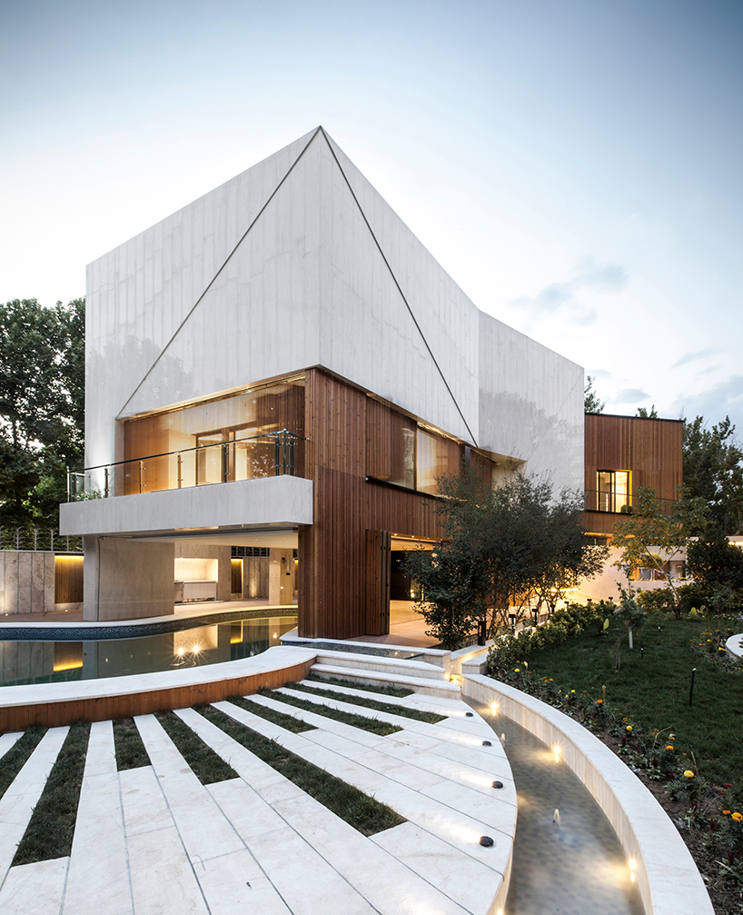 kooshk house uses flexible facade to maintain privacy and unity with nature