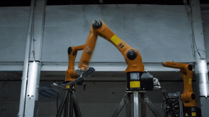 nigel stanford's automatica shows mechanical arms that rock and revolt