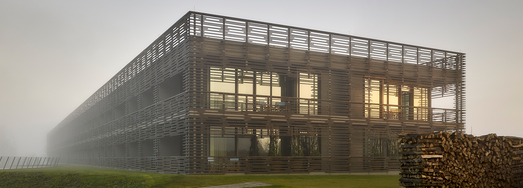 graft architects embed hotel and spa into the hilly landscape of germany