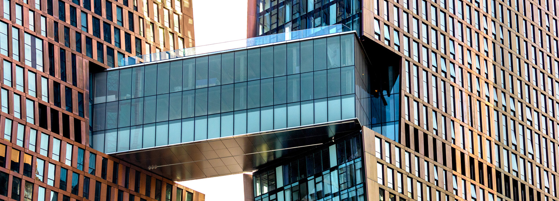 SHoP architects completes skybridge at the american copper buildings