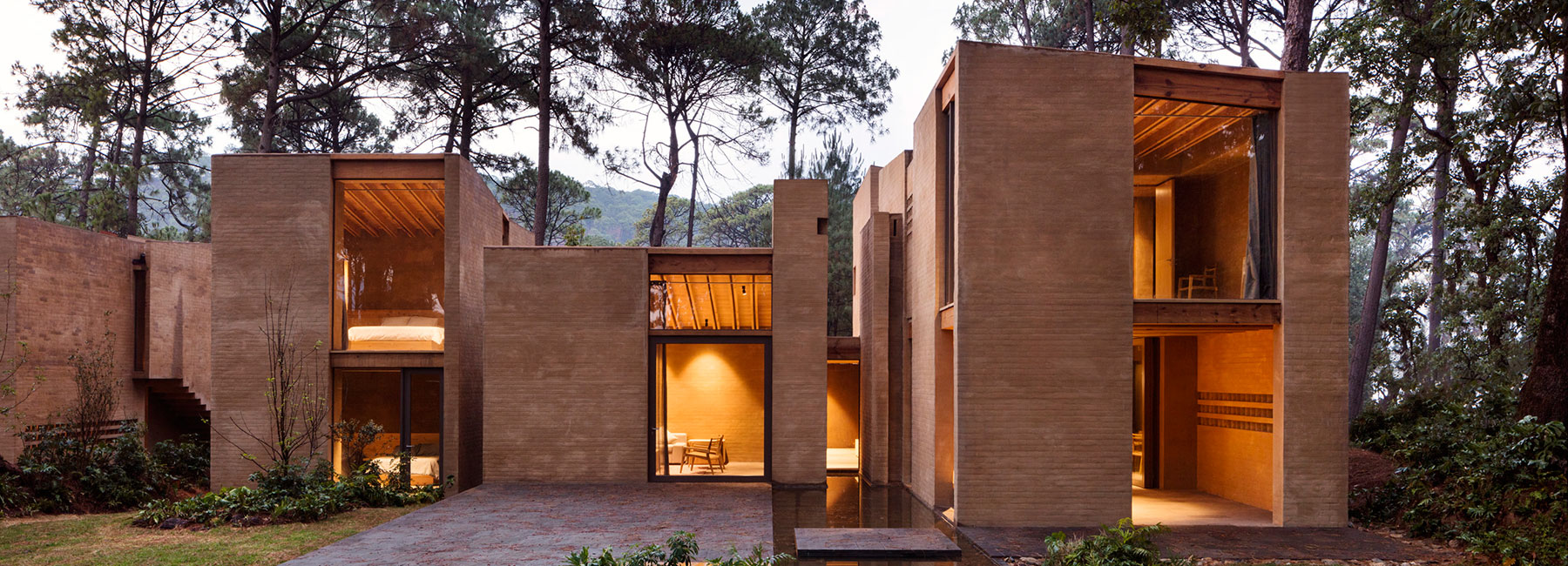 taller hector barroso layers vacation estate with pine trees in mexico