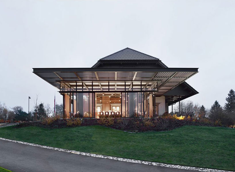 the rustic mansion is both a clubhouse and small hotel within a ...