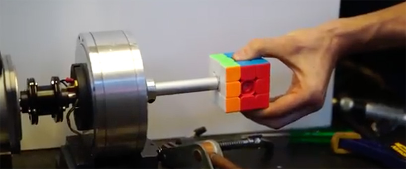 watch this robot solve a rubik's cube in under a second