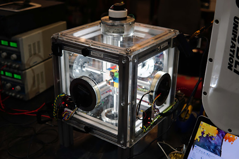 watch this robot solve a rubik's cube in under a second