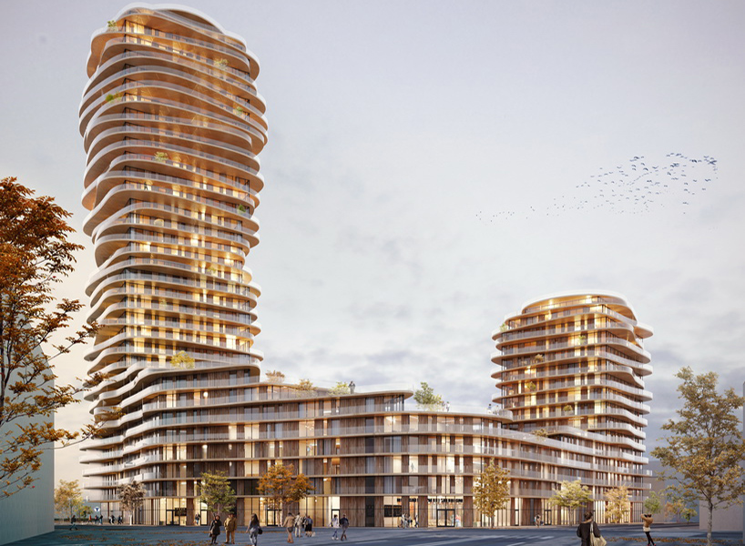 'discus' is a beautiful building in the middle of an upcoming city with ...