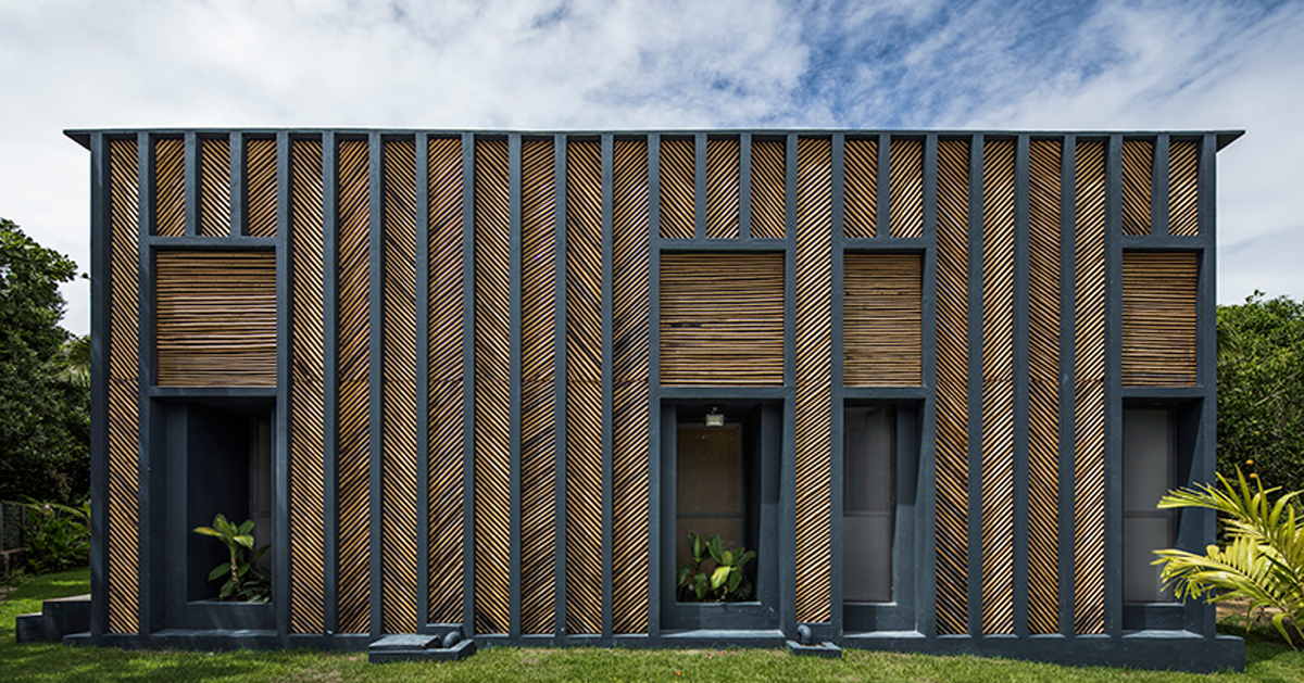 vilela florez arranges bamboo in a herringbone pattern for the facade of this brazilian residence