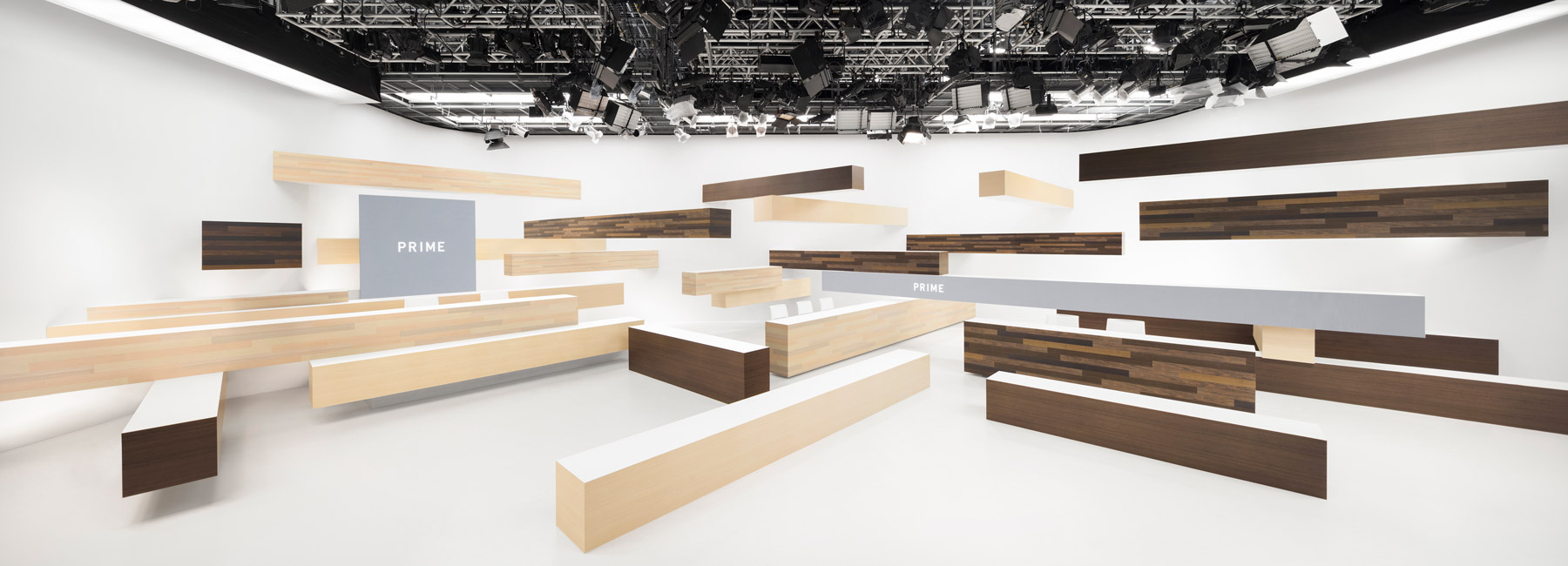 nendo designs prime news branding and studio set for a japanese TV station