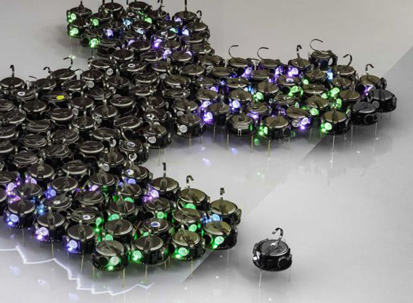 these bio-inspired robots connect like cells in the body, communicating locally and ...