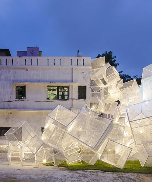 abin design studio forms the festive pavilion from tessellated boxes in ...