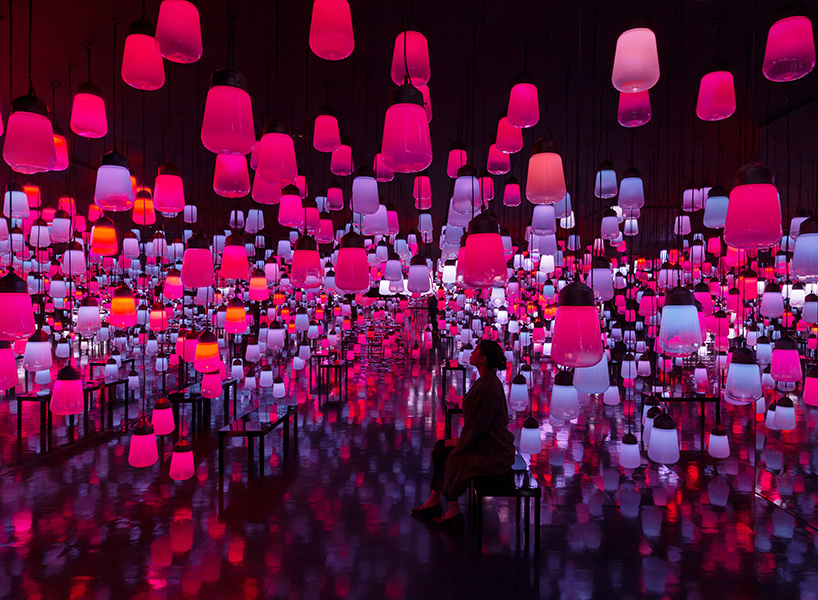 a lighting display of many colors; teamlab bathes a japan hotel lobby ...
