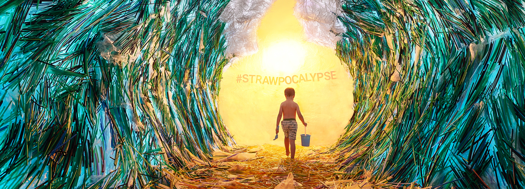 168,000 used straws were artfully repurposed into two crashing waves of ...