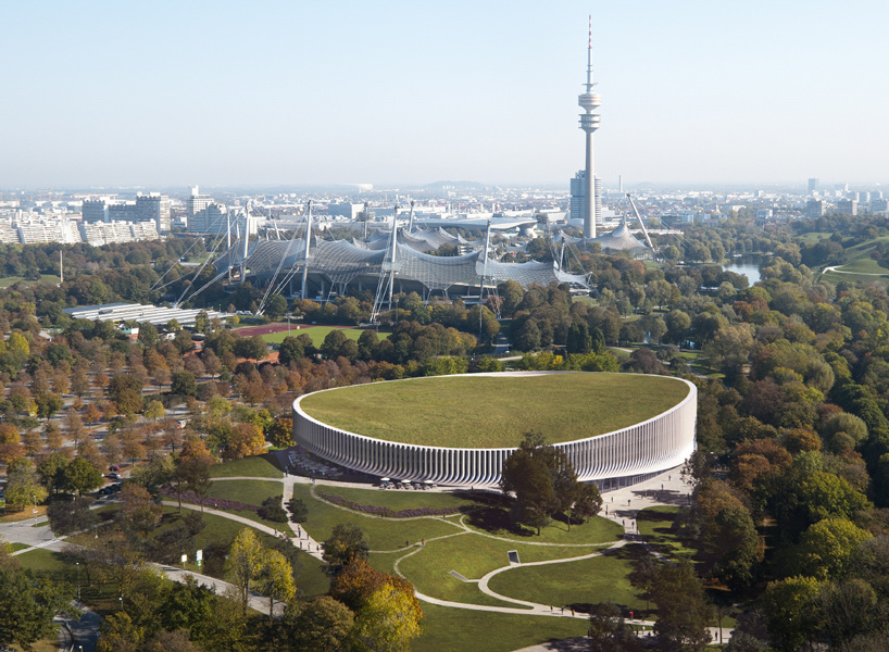 the oval-shaped building has been designed to fit into the context of ...