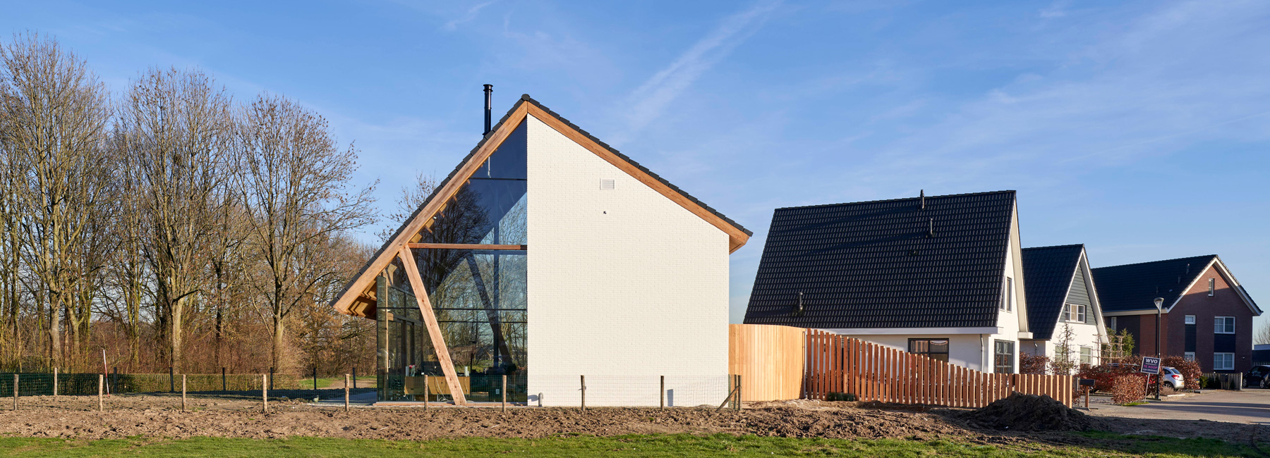 RV architecture completes gabled-roof wooden barnhouse in werkhoven ...