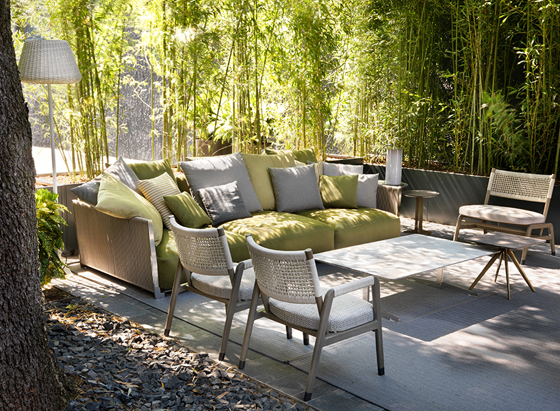 the furniture collection is artisanally crafted from a harmonious mix of iroko wood, upholstery ...