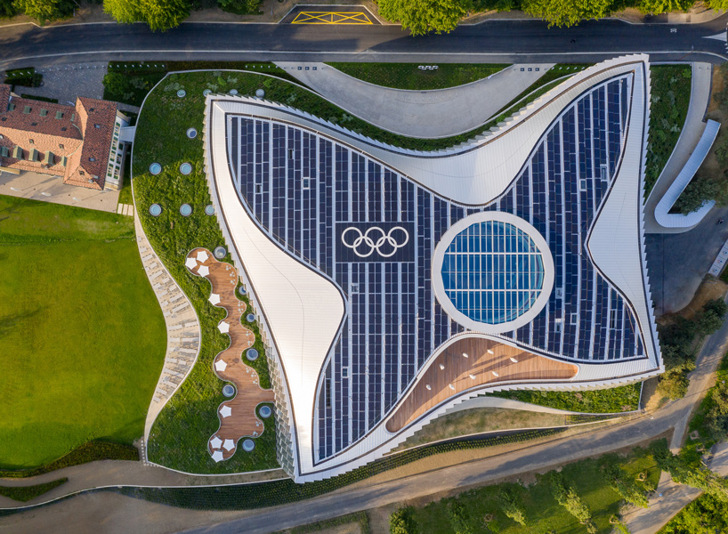 the dynamic, undulating flow of the façade appears differently from all ...