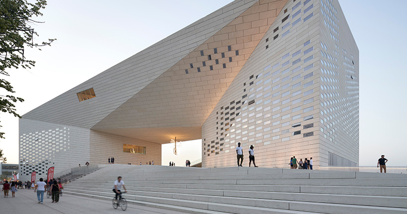 bjarke ingels group's MÉCA cultural center documented by nils koenning