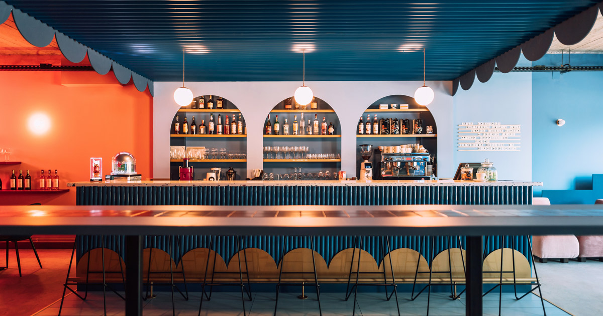 biancoebianca combines soft shapes with terrazo in romanian restaurant