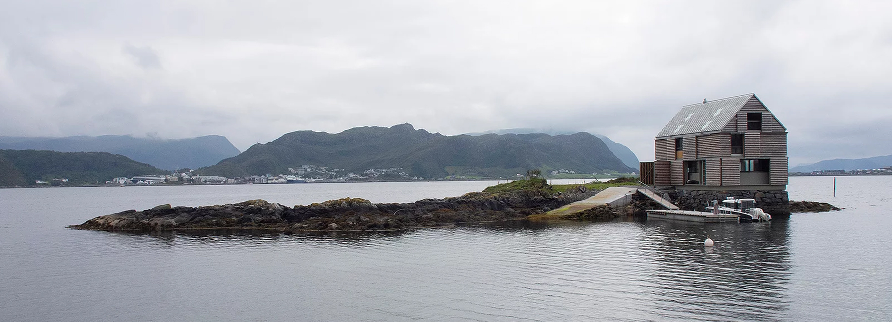 knut hjeltnes builds timber weekend house on a norwegian islet of its own