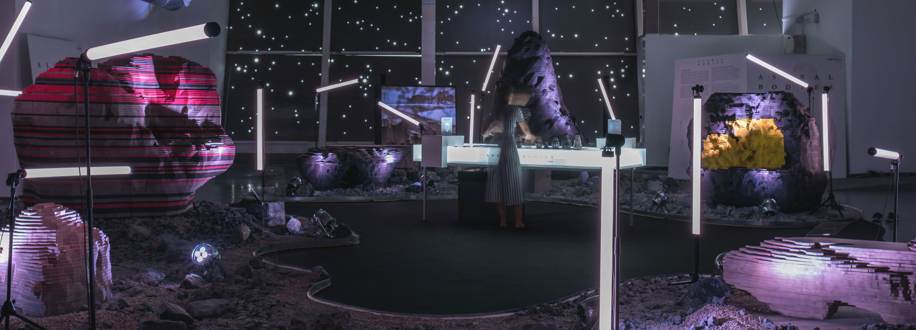 ENORME studio designs an outer space exhibition featuring 'astral bodies'