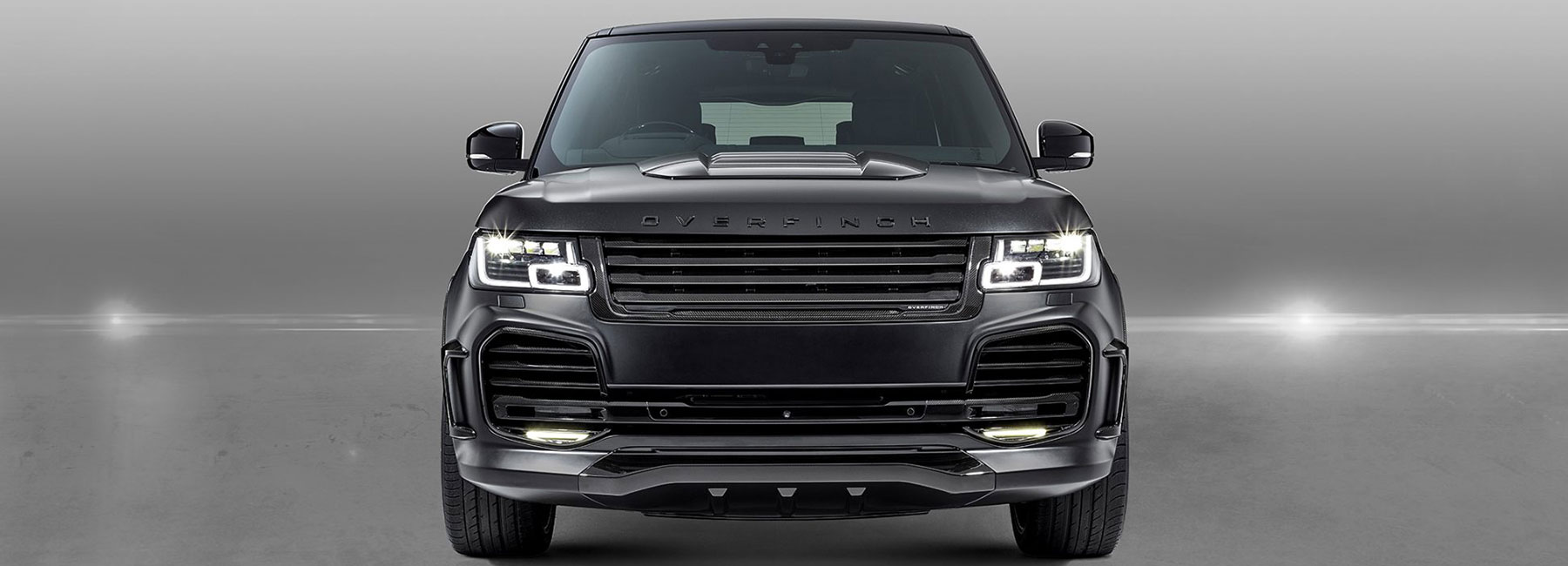 overfinch velocity range rover coated in crushed carbon fiber pieces