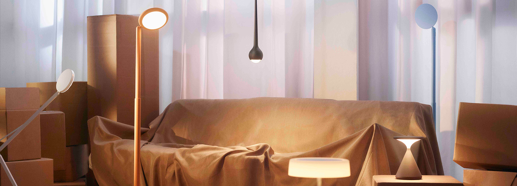 tobias grau's new sculptural, portable and dimmable lighting designs