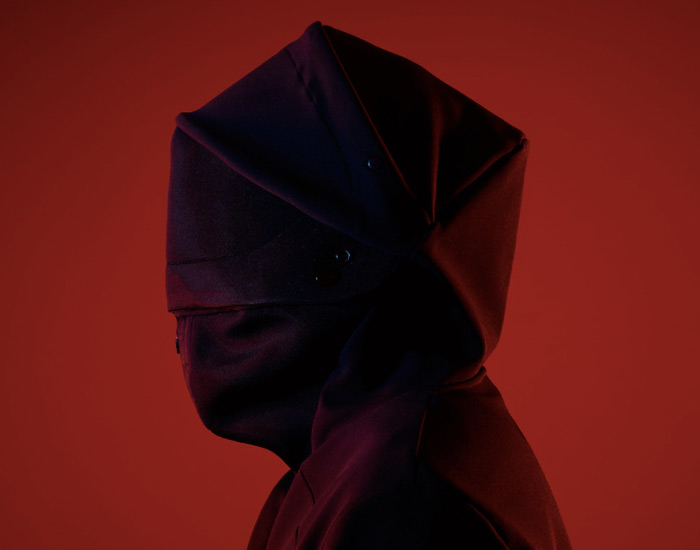 the hood of the jacket mimics the protective exoskeleton of the ...