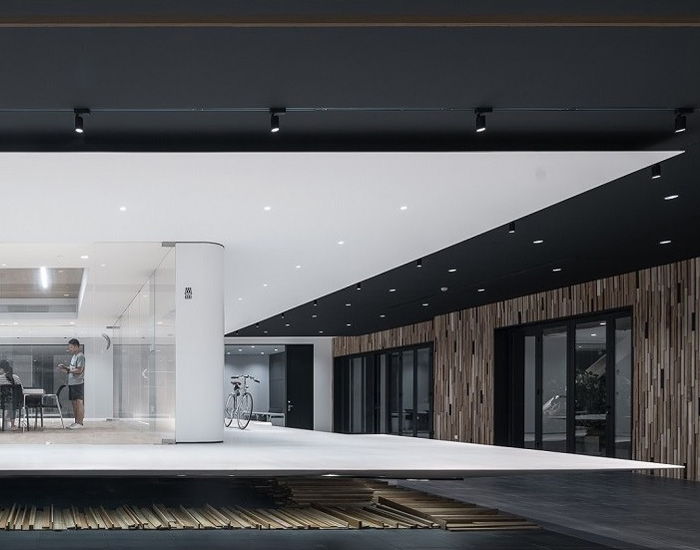 the design meets the needs of two separate companies and includes space ...