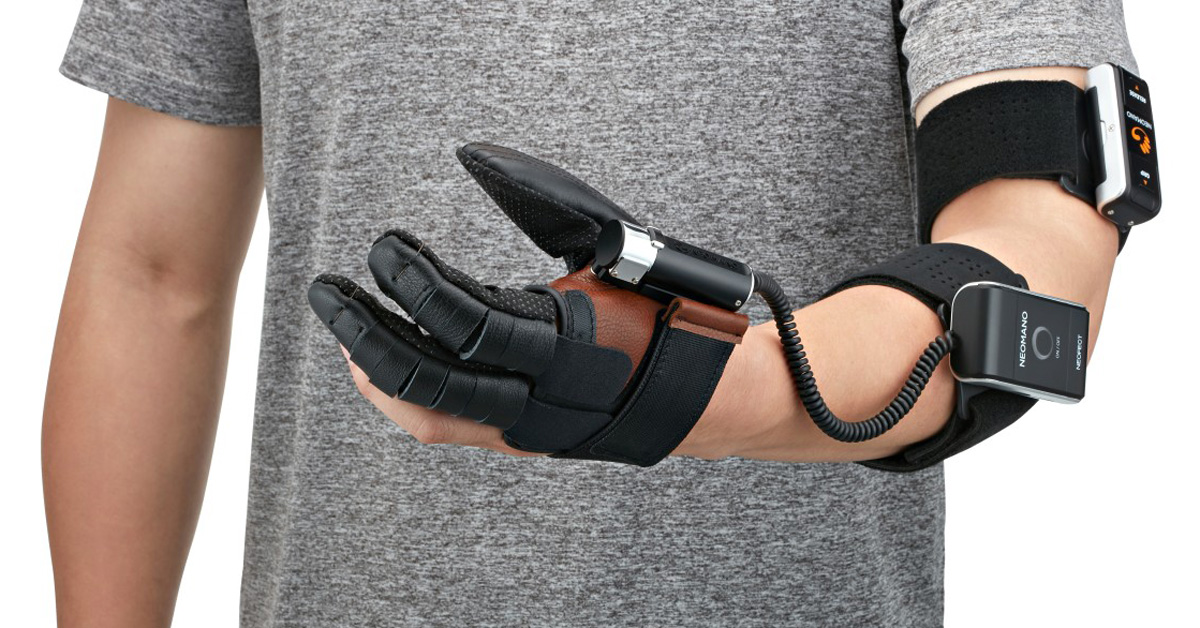 the neomano robotic glove powers people with hand paralysis