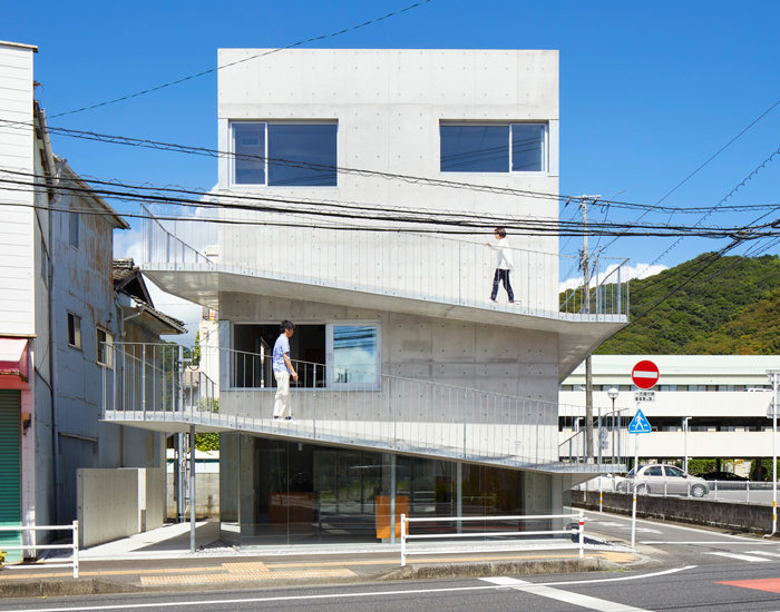 takao shiotsuka atelier connects the floors of SJ building in japan via ...