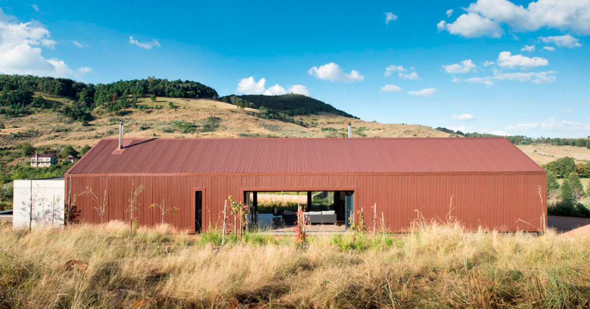 w design architecture studio creates barn-like house in south africa
