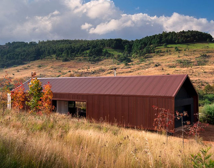 titled 'unfolding the land', the weekend house has been realized amid a ...