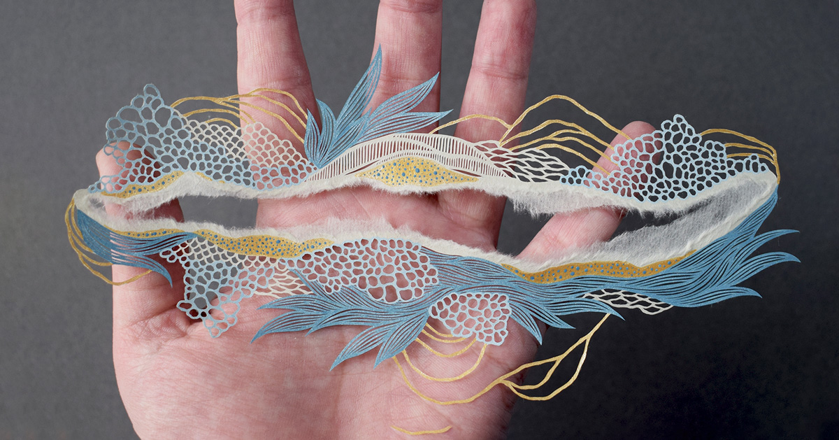 artist pippa dyrlaga cuts intricately detailed landscapes from paper