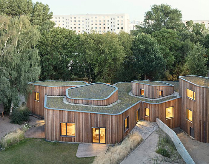 green roofs and timber façades articulate mono architekten’s school ...