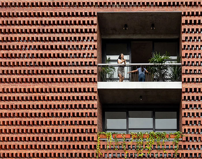 the layered external envelope is formed by glass, vegetation and local ...