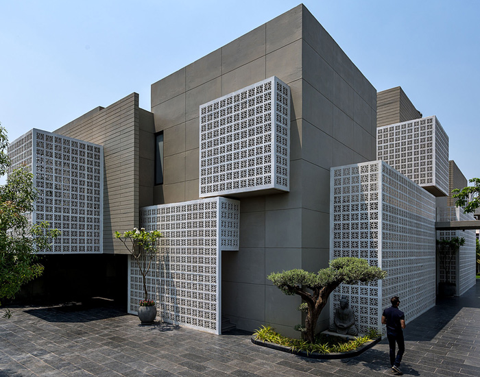 sanjay puri architects uses 18 screens to shield house in northern ...