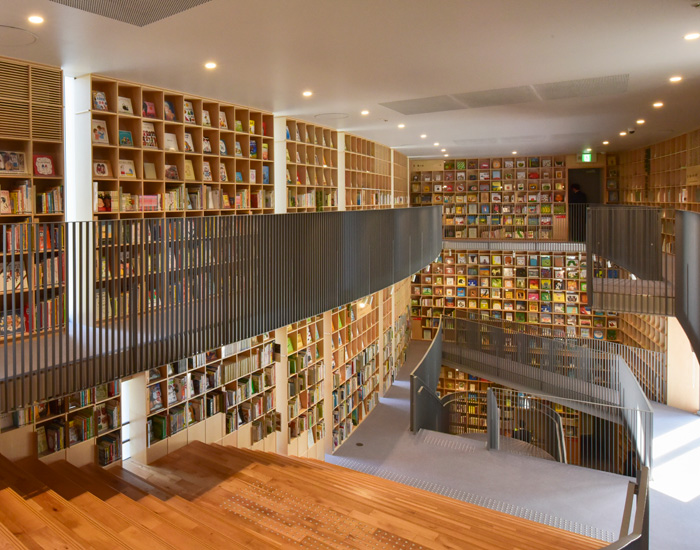 tadao ando maintains an open and uncluttered interior by integrating ...