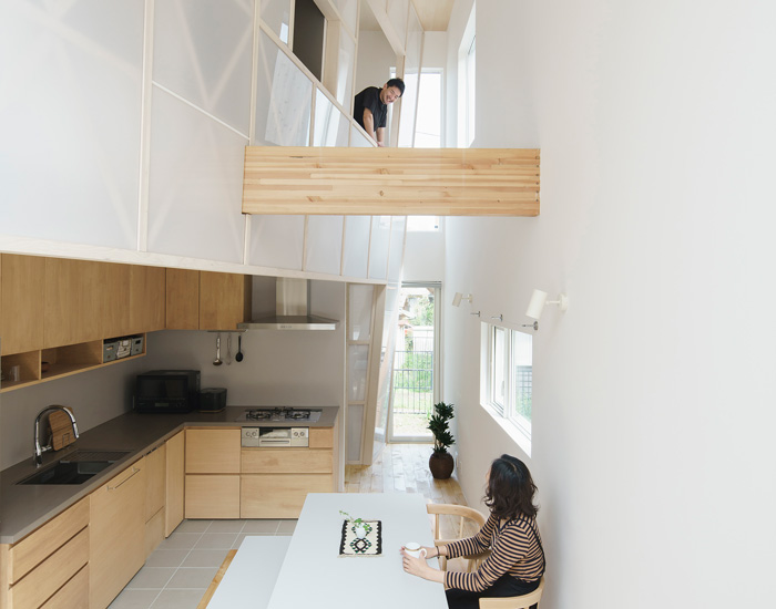 made of acrylic panels and hemlock grids, this 'curtain' gently divides ...