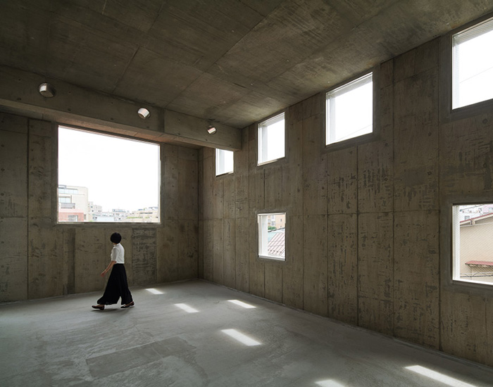 large and small windows create an illusion of scale.