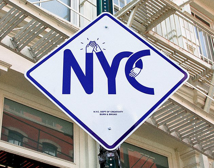 the light-hearted graphics force passersby to look up, peal their faces ...