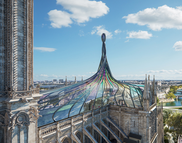 at night, the rooftop glass sculpture glows in the dark.