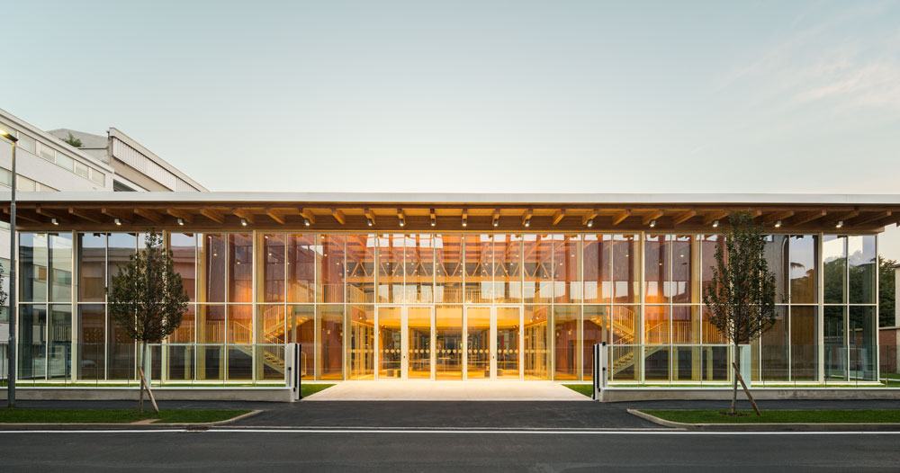 AMDL CIRCLE's Z-LIFE occupies a glass box within an industrial factory