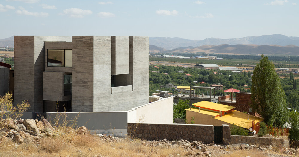 iranian studio MAAN sculpts its 'ayenevarzan house' of solids and voids