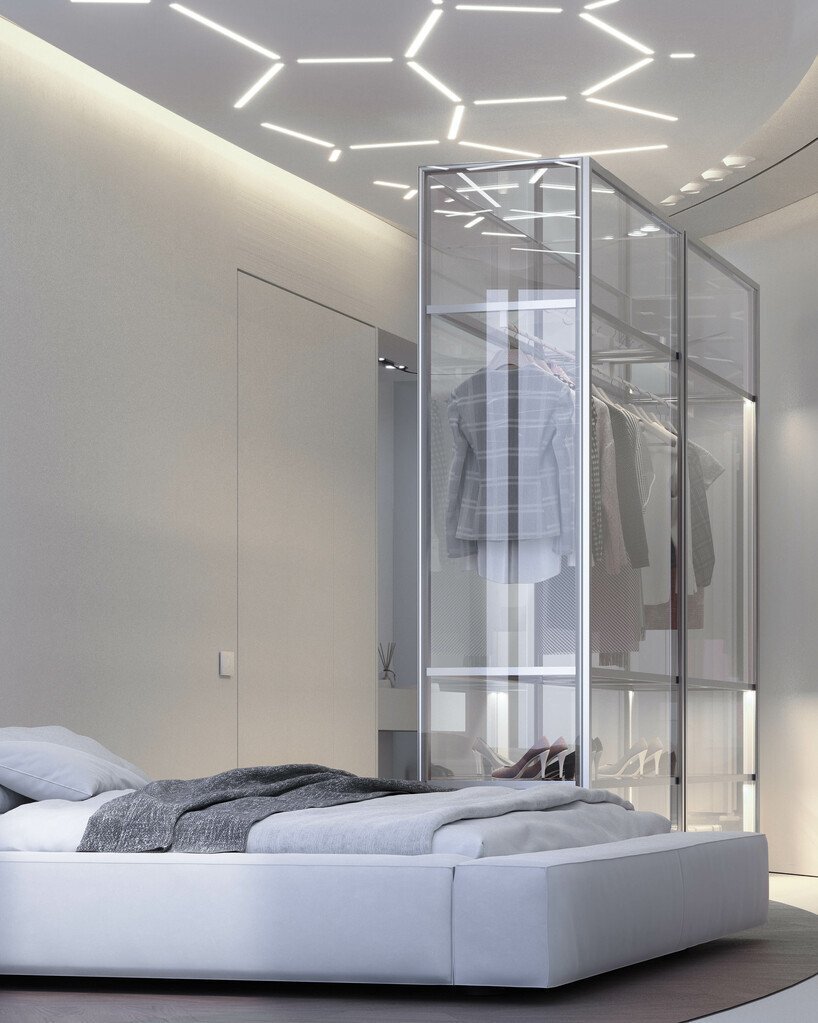 white convex walls dominate the interior of a futuristic apartment by ...