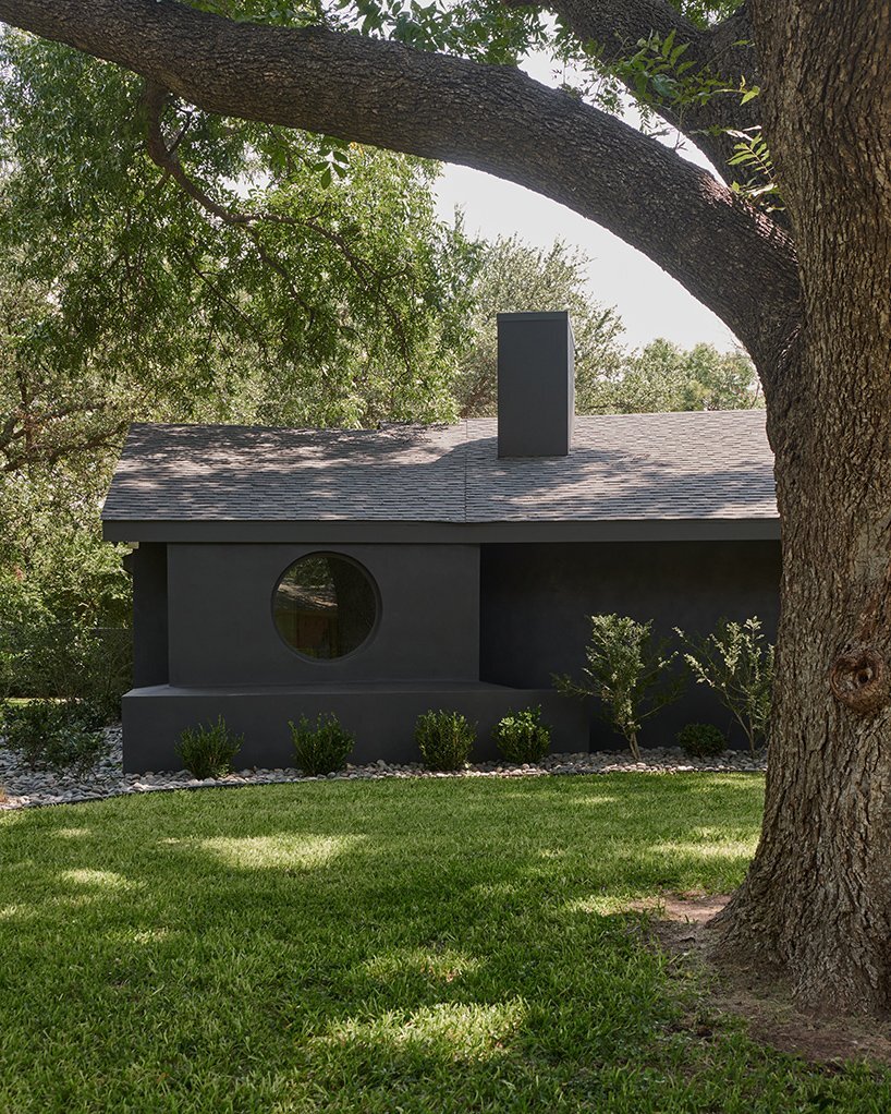 eagle house revives its interior maintaining the mid-century envelope