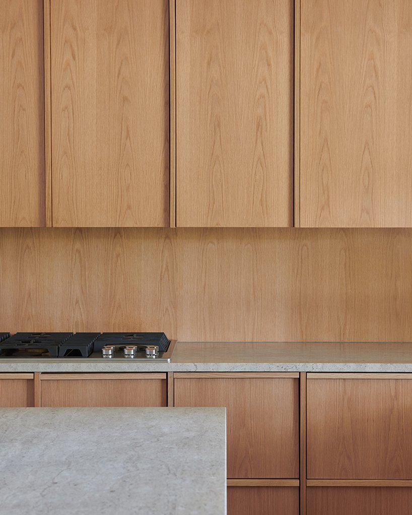 eagle house revives its interior maintaining the mid-century envelope